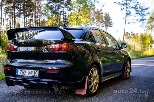 Black Mitsubishi Lancer 2008 in Parnu, with an engine capacity of 1.80 L and mileage of 270 thousand km for 4499 €, photo 6 on AUTOMOTO.COM.LV