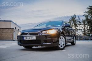Black Mitsubishi Lancer 2008 in Riga, with an engine capacity of 1.50 L and mileage of 226 thousand km for 1800 €, photo  on AUTOMOTO.COM.LV