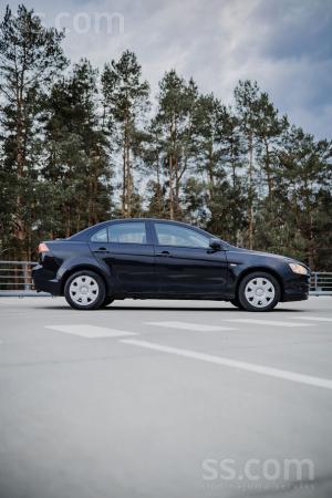 Melns Mitsubishi Lancer 2008 Rīga, ar dzinēja tilpumu 1.50 L un nobraukumu 226 tūkst. km par 1800 €, foto 3 vietnē AUTOMOTO.COM.LV
