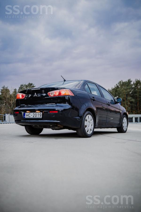 Melns Mitsubishi Lancer 2008 Rīga, ar dzinēja tilpumu 1.50 L un nobraukumu 226 tūkst. km par 1800 €, foto 3 vietnē AUTOMOTO.COM.LV