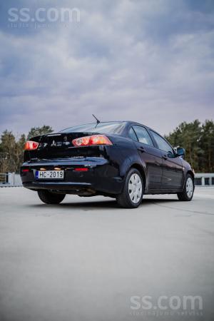 Melns Mitsubishi Lancer 2008 Rīga, ar dzinēja tilpumu 1.50 L un nobraukumu 226 tūkst. km par 1800 €, foto 4 vietnē AUTOMOTO.COM.LV