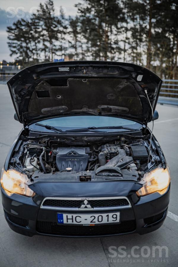 Melns Mitsubishi Lancer 2008 Rīga, ar dzinēja tilpumu 1.50 L un nobraukumu 226 tūkst. km par 1800 €, foto 5 vietnē AUTOMOTO.COM.LV