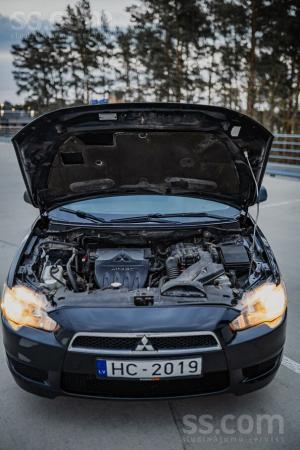 Melns Mitsubishi Lancer 2008 Rīga, ar dzinēja tilpumu 1.50 L un nobraukumu 226 tūkst. km par 1800 €, foto 6 vietnē AUTOMOTO.COM.LV