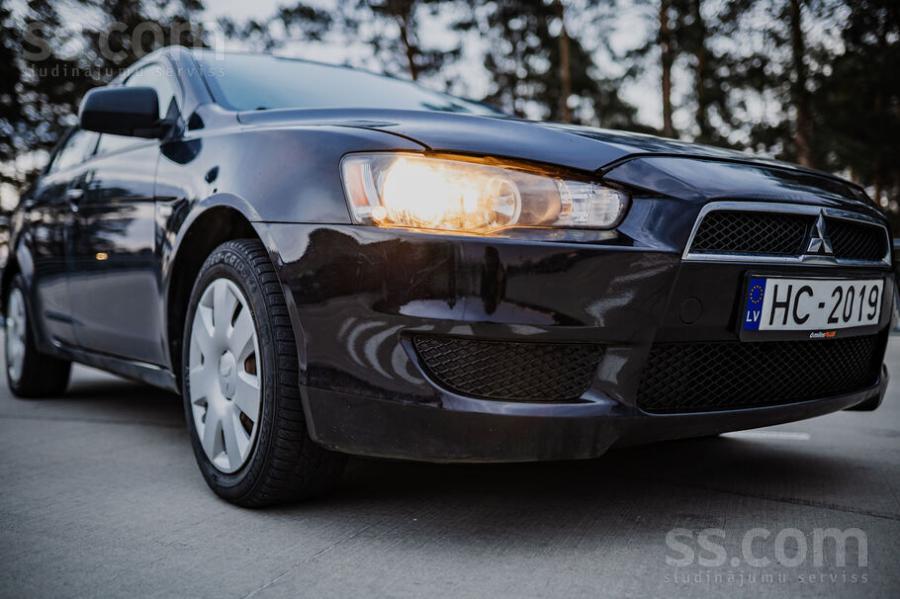Melns Mitsubishi Lancer 2008 Rīga, ar dzinēja tilpumu 1.50 L un nobraukumu 226 tūkst. km par 1800 €, foto 7 vietnē AUTOMOTO.COM.LV