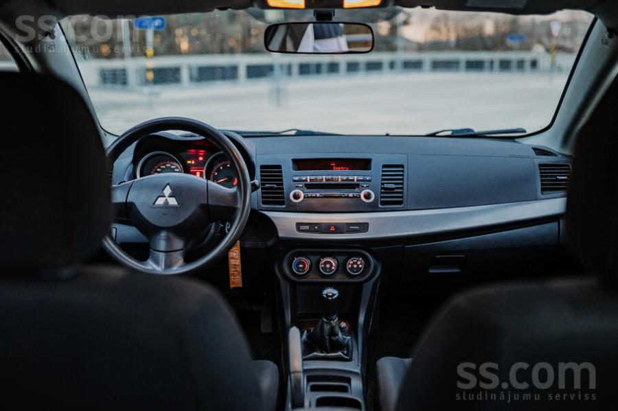 Melns Mitsubishi Lancer 2008 Rīga, ar dzinēja tilpumu 1.50 L un nobraukumu 226 tūkst. km par 1800 €, foto 8 vietnē AUTOMOTO.COM.LV