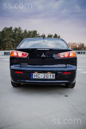 Melns Mitsubishi Lancer 2008 Rīga, ar dzinēja tilpumu 1.50 L un nobraukumu 226 tūkst. km par 1800 €, foto 15 vietnē AUTOMOTO.COM.LV