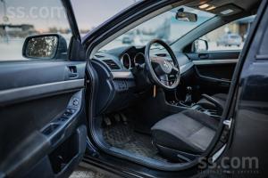 Melns Mitsubishi Lancer 2008 Rīga, ar dzinēja tilpumu 1.50 L un nobraukumu 226 tūkst. km par 1800 €, foto 17 vietnē AUTOMOTO.COM.LV