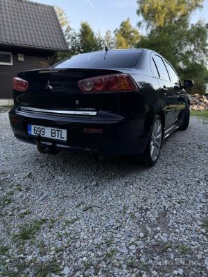 Melns Mitsubishi Lancer 2008 Tallina, ar dzinēja tilpumu 2.00 L un nobraukumu 0 tūkst. km par 3500 €, foto 3 vietnē AUTOMOTO.COM.LV