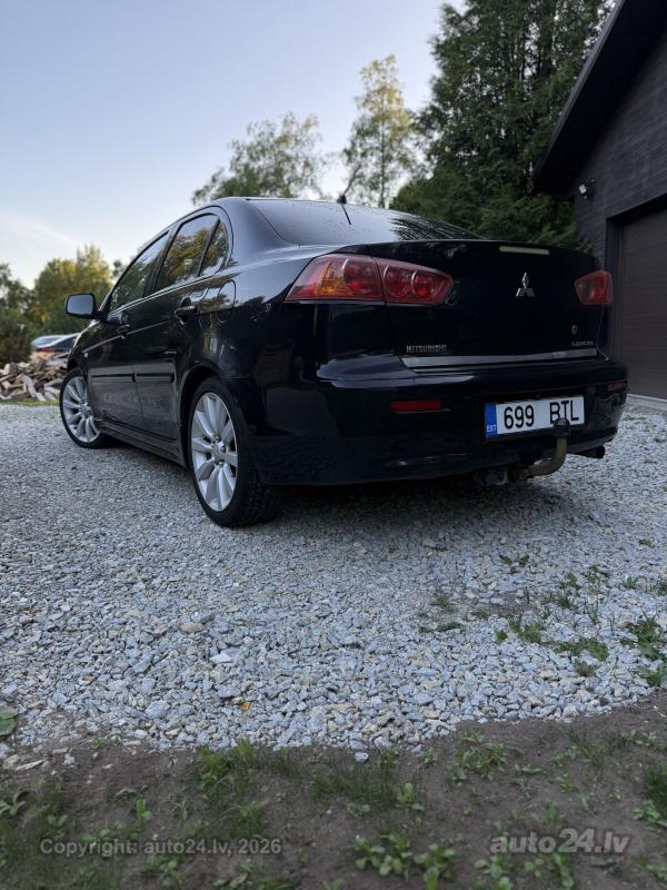 Melns Mitsubishi Lancer 2008 Tallina, ar dzinēja tilpumu 2.00 L un nobraukumu 0 tūkst. km par 3500 €, foto 3 vietnē AUTOMOTO.COM.LV