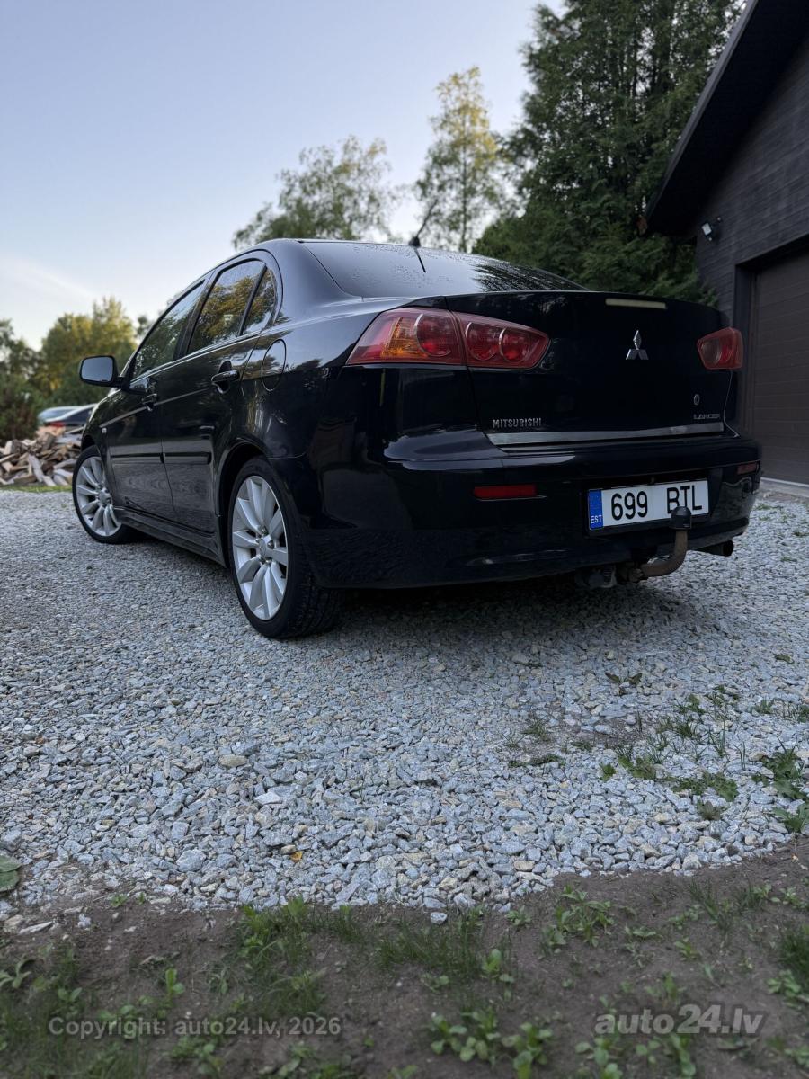 Melns Mitsubishi Lancer 2008 Tallina, ar dzinēja tilpumu 2.00 L un nobraukumu 0 tūkst. km par 3500 €, foto 4 vietnē AUTOMOTO.COM.LV