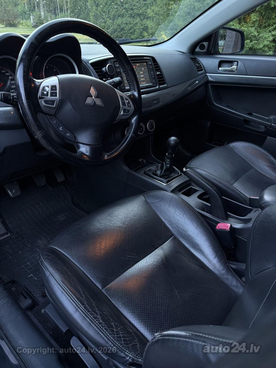 Melns Mitsubishi Lancer 2008 Tallina, ar dzinēja tilpumu 2.00 L un nobraukumu 0 tūkst. km par 3500 €, foto 5 vietnē AUTOMOTO.COM.LV