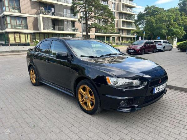 Black Mitsubishi Lancer 2008 in Vilnius, with an engine capacity of 1.80 L and mileage of 255 thousand km for 2950 €, photo 3 on AUTOMOTO.COM.LV