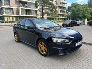 Black Mitsubishi Lancer 2008 in Vilnius, with an engine capacity of 1.80 L and mileage of 255 thousand km for 2950 €, photo 4 on AUTOMOTO.COM.LV
