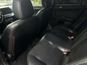 Black Mitsubishi Lancer 2008 in Vilnius, with an engine capacity of 1.80 L and mileage of 255 thousand km for 2950 €, photo 11 on AUTOMOTO.COM.LV