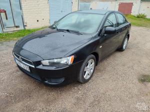 Black Mitsubishi Lancer 2008 in Utena, with an engine capacity of 2.00 L and mileage of 390 thousand km for 850 €, photo  on AUTOMOTO.COM.LV