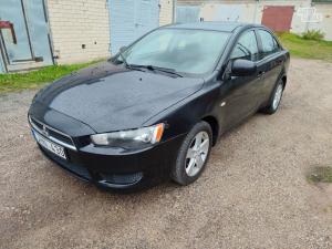 Black Mitsubishi Lancer 2008 in Utena, with an engine capacity of 2.00 L and mileage of 390 thousand km for 850 €, photo 3 on AUTOMOTO.COM.LV