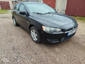 Black Mitsubishi Lancer 2008 in Utena, with an engine capacity of 2.00 L and mileage of 390 thousand km for 850 €, photo 5 on AUTOMOTO.COM.LV