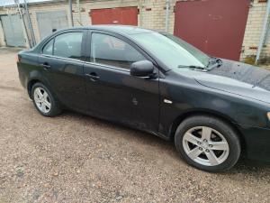 Black Mitsubishi Lancer 2008 in Utena, with an engine capacity of 2.00 L and mileage of 390 thousand km for 850 €, photo 6 on AUTOMOTO.COM.LV