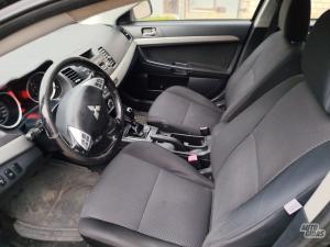 Black Mitsubishi Lancer 2008 in Utena, with an engine capacity of 2.00 L and mileage of 390 thousand km for 850 €, photo 10 on AUTOMOTO.COM.LV
