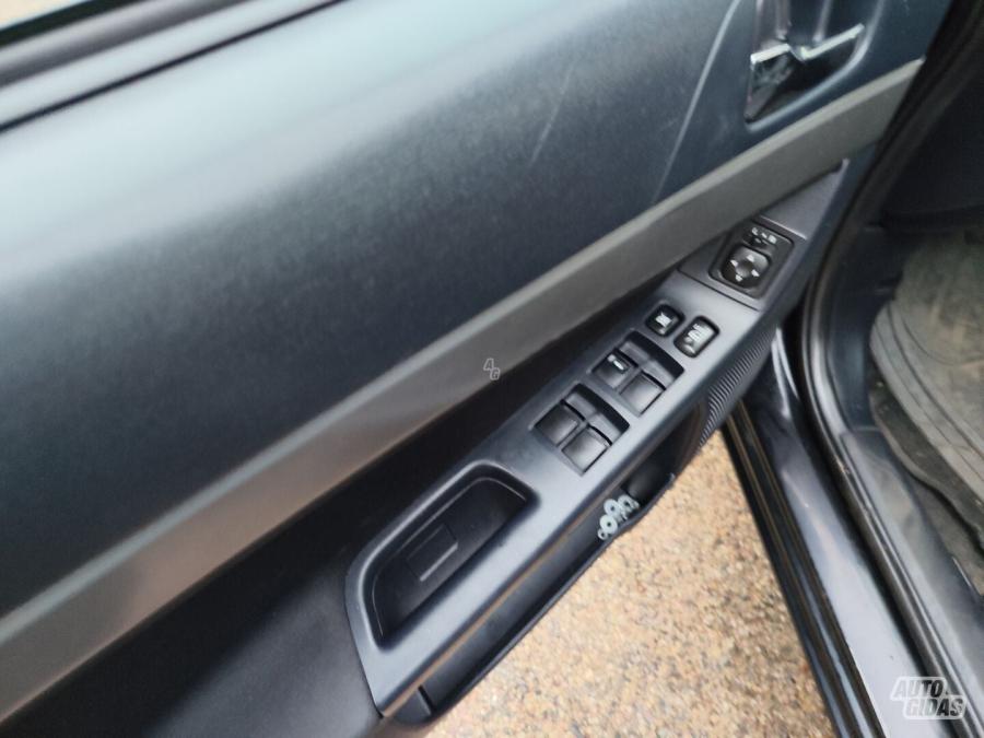 Black Mitsubishi Lancer 2008 in Utena, with an engine capacity of 2.00 L and mileage of 390 thousand km for 850 €, photo 11 on AUTOMOTO.COM.LV