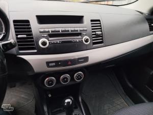 Black Mitsubishi Lancer 2008 in Utena, with an engine capacity of 2.00 L and mileage of 390 thousand km for 850 €, photo 15 on AUTOMOTO.COM.LV