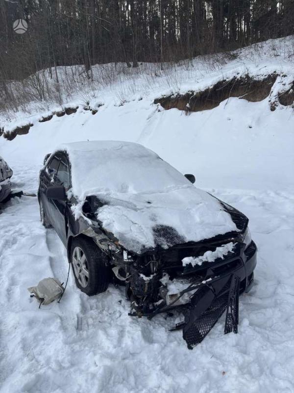 Black Mitsubishi Lancer 2009 in Kaunas, with an engine capacity of 1.97 L and mileage of 333 thousand km for 750 €, photo 3 on AUTOMOTO.COM.LV