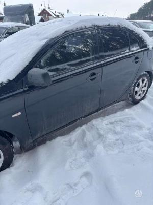 Melns Mitsubishi Lancer 2009 Kauņa, ar dzinēja tilpumu 1.97 L un nobraukumu 333 tūkst. km par 750 €, foto 5 vietnē AUTOMOTO.COM.LV