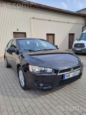 Melns Mitsubishi Lancer 2009 Liepāja, ar dzinēja tilpumu 1.80 L un nobraukumu 293 tūkst. km par 2200 €, foto  vietnē AUTOMOTO.COM.LV