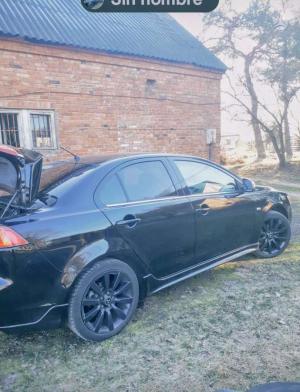 Black Mitsubishi Lancer 2011 in Kaunas, with an engine capacity of 1.50 L and mileage of 250 thousand km for 4000 €, photo  on AUTOMOTO.COM.LV