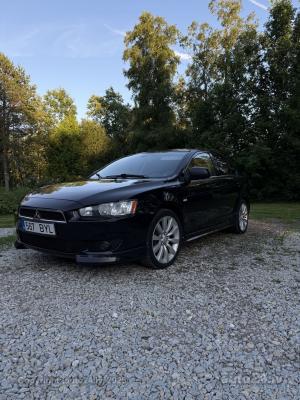 Black Mitsubishi Lancer 2011 in Tallinn, with an engine capacity of 2.00 L and mileage of 231 thousand km for 5400 €, photo  on AUTOMOTO.COM.LV