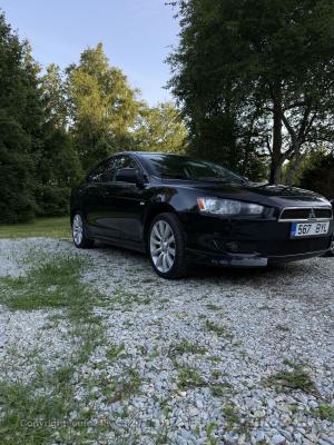 Melns Mitsubishi Lancer 2011 Tallina, ar dzinēja tilpumu 2.00 L un nobraukumu 231 tūkst. km par 5400 €, foto 3 vietnē AUTOMOTO.COM.LV