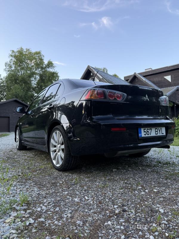 Melns Mitsubishi Lancer 2011 Tallina, ar dzinēja tilpumu 2.00 L un nobraukumu 231 tūkst. km par 5400 €, foto 3 vietnē AUTOMOTO.COM.LV