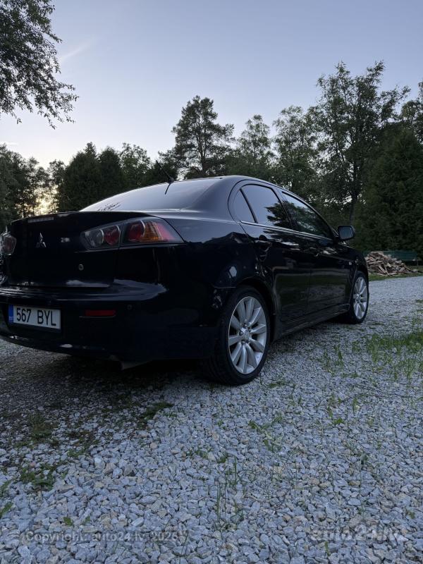 Melns Mitsubishi Lancer 2011 Tallina, ar dzinēja tilpumu 2.00 L un nobraukumu 231 tūkst. km par 5400 €, foto 4 vietnē AUTOMOTO.COM.LV