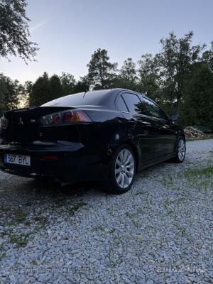 Melns Mitsubishi Lancer 2011 Tallina, ar dzinēja tilpumu 2.00 L un nobraukumu 231 tūkst. km par 5400 €, foto 5 vietnē AUTOMOTO.COM.LV