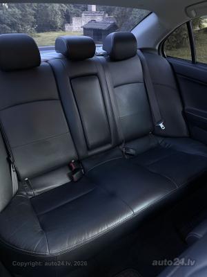 Melns Mitsubishi Lancer 2011 Tallina, ar dzinēja tilpumu 2.00 L un nobraukumu 231 tūkst. km par 5400 €, foto 6 vietnē AUTOMOTO.COM.LV