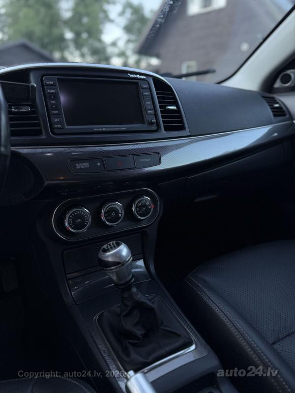 Melns Mitsubishi Lancer 2011 Tallina, ar dzinēja tilpumu 2.00 L un nobraukumu 231 tūkst. km par 5400 €, foto 8 vietnē AUTOMOTO.COM.LV