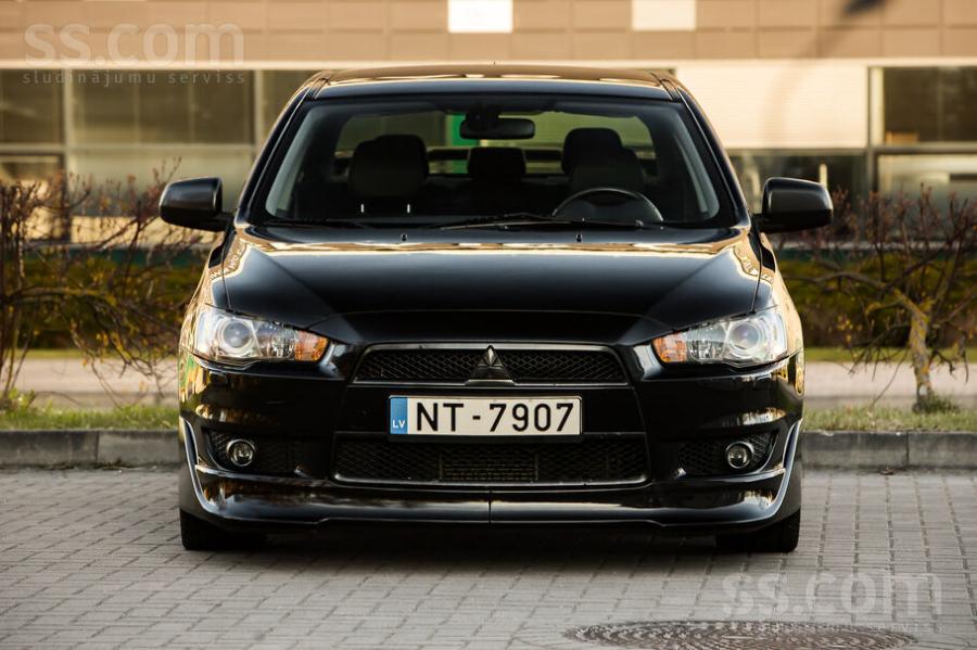Black Mitsubishi Lancer 2012 in Jelgava, with an engine capacity of 1.80 L and mileage of 0 thousand km for 6450 €, photo 3 on AUTOMOTO.COM.LV