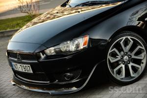 Black Mitsubishi Lancer 2012 in Jelgava, with an engine capacity of 1.80 L and mileage of 0 thousand km for 6450 €, photo 6 on AUTOMOTO.COM.LV