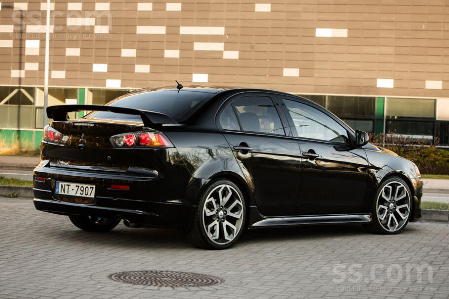Black Mitsubishi Lancer 2012 in Jelgava, with an engine capacity of 1.80 L and mileage of 0 thousand km for 6450 €, photo 11 on AUTOMOTO.COM.LV
