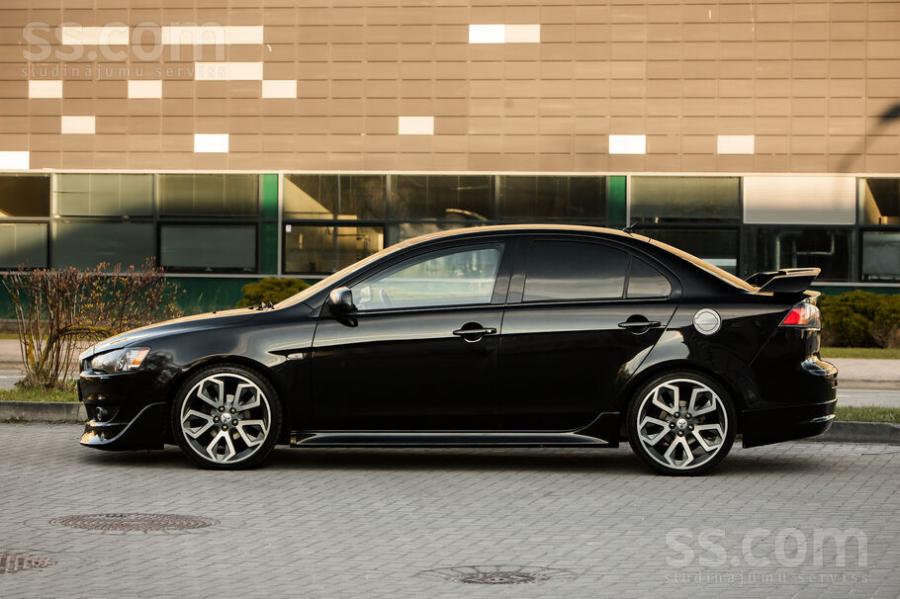 Black Mitsubishi Lancer 2012 in Jelgava, with an engine capacity of 1.80 L and mileage of 0 thousand km for 6450 €, photo 13 on AUTOMOTO.COM.LV