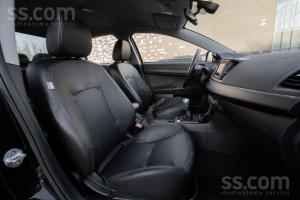 Black Mitsubishi Lancer 2012 in Jelgava, with an engine capacity of 1.80 L and mileage of 0 thousand km for 6450 €, photo 15 on AUTOMOTO.COM.LV