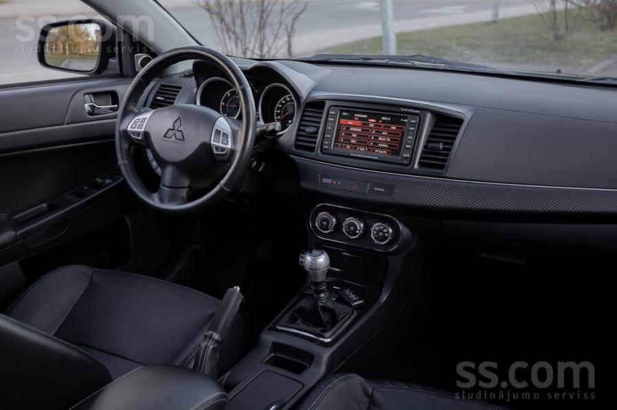 Black Mitsubishi Lancer 2012 in Jelgava, with an engine capacity of 1.80 L and mileage of 0 thousand km for 6450 €, photo 16 on AUTOMOTO.COM.LV