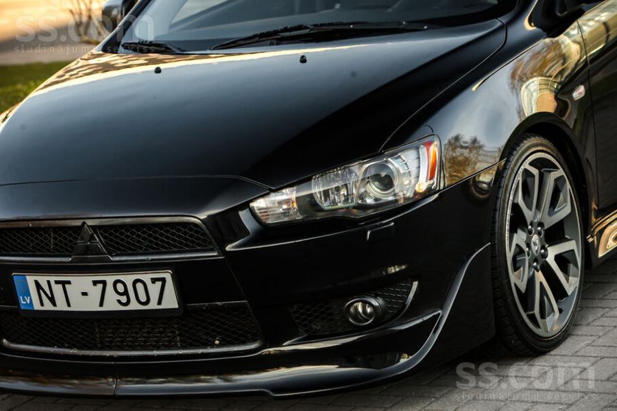 Black Mitsubishi Lancer 2012 in Jelgava, with an engine capacity of 1.80 L and mileage of 207 thousand km for 5900 €, photo 4 on AUTOMOTO.COM.LV