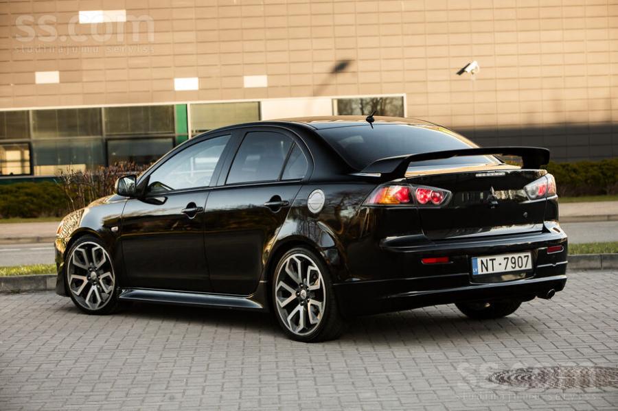 Black Mitsubishi Lancer 2012 in Jelgava, with an engine capacity of 1.80 L and mileage of 207 thousand km for 5900 €, photo 6 on AUTOMOTO.COM.LV