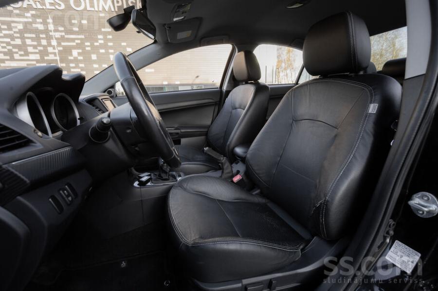 Black Mitsubishi Lancer 2012 in Jelgava, with an engine capacity of 1.80 L and mileage of 207 thousand km for 5900 €, photo 16 on AUTOMOTO.COM.LV
