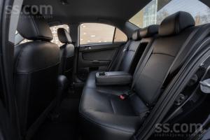 Black Mitsubishi Lancer 2012 in Jelgava, with an engine capacity of 1.80 L and mileage of 207 thousand km for 5900 €, photo 17 on AUTOMOTO.COM.LV
