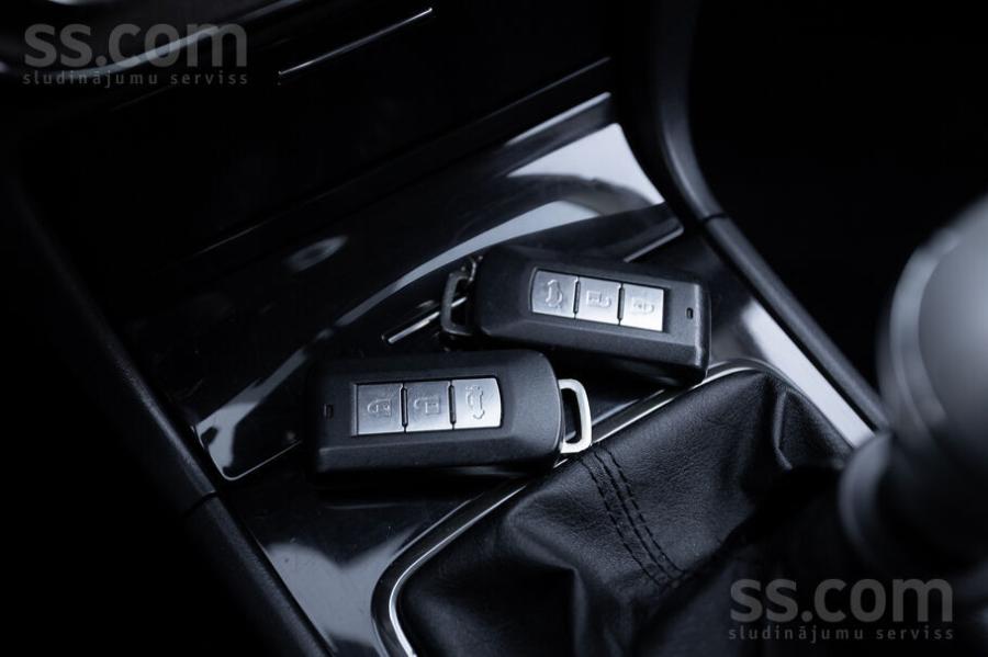 Black Mitsubishi Lancer 2012 in Jelgava, with an engine capacity of 1.80 L and mileage of 207 thousand km for 5900 €, photo 18 on AUTOMOTO.COM.LV