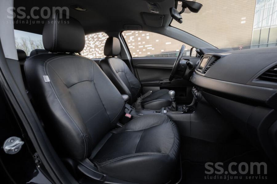 Black Mitsubishi Lancer 2012 in Jelgava, with an engine capacity of 1.80 L and mileage of 207 thousand km for 5900 €, photo 19 on AUTOMOTO.COM.LV
