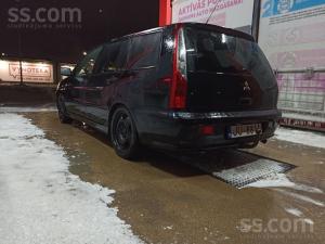 Black Mitsubishi Lancer 2003 in Riga, with an engine capacity of 2.00 L and mileage of 330 thousand km for 500 €, photo 2 on AUTOMOTO.COM.LV