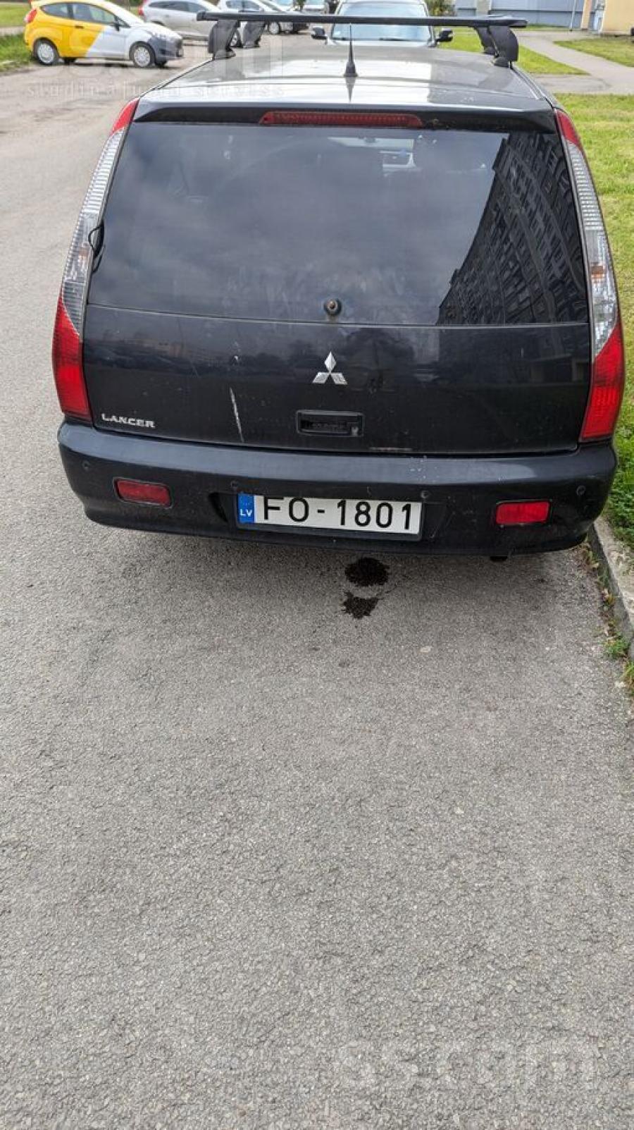 Melns Mitsubishi Lancer 2005 Rīga, ar dzinēja tilpumu 2.00 L un nobraukumu 240 tūkst. km par 1000 €, foto 1 vietnē AUTOMOTO.COM.LV